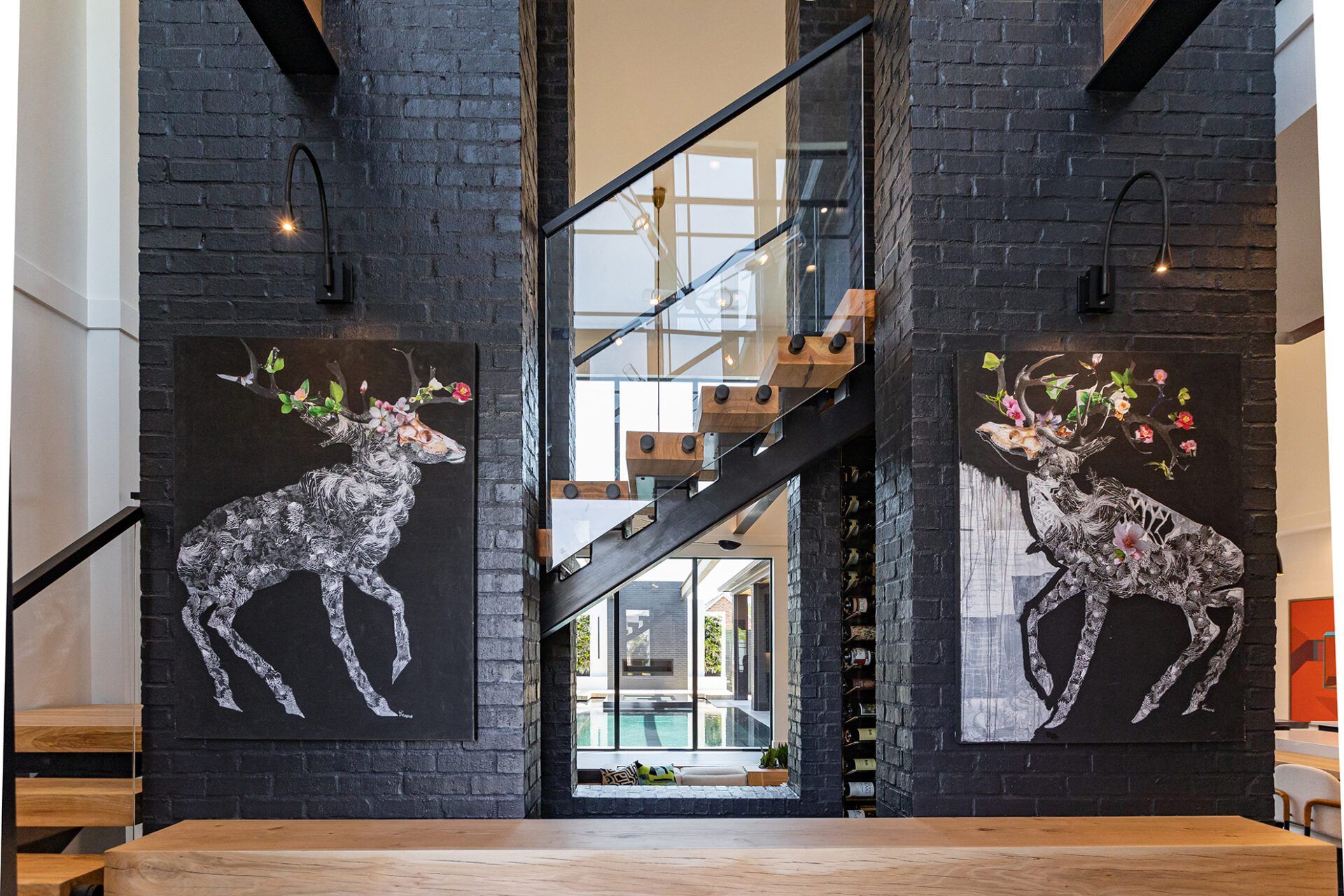 Black is far from basic at a Rouzan home that sleekly links indoors and ...