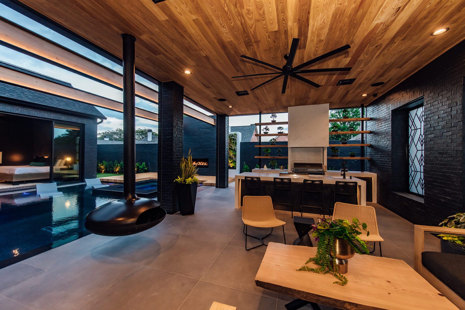 Black is far from basic at a Rouzan home that sleekly links indoors and ...