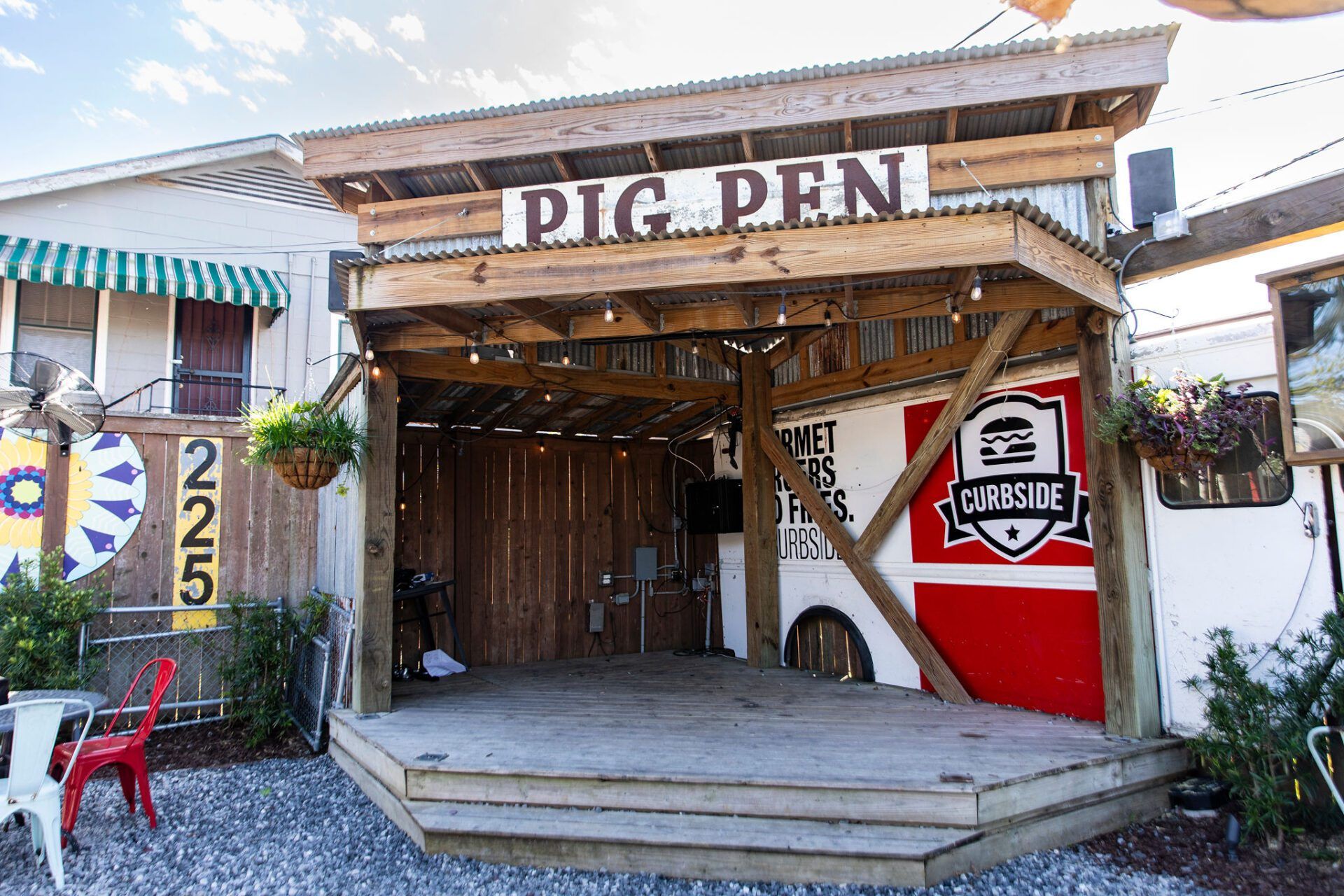 Curbside Burgers unveils patio improvements, launches new mural ...